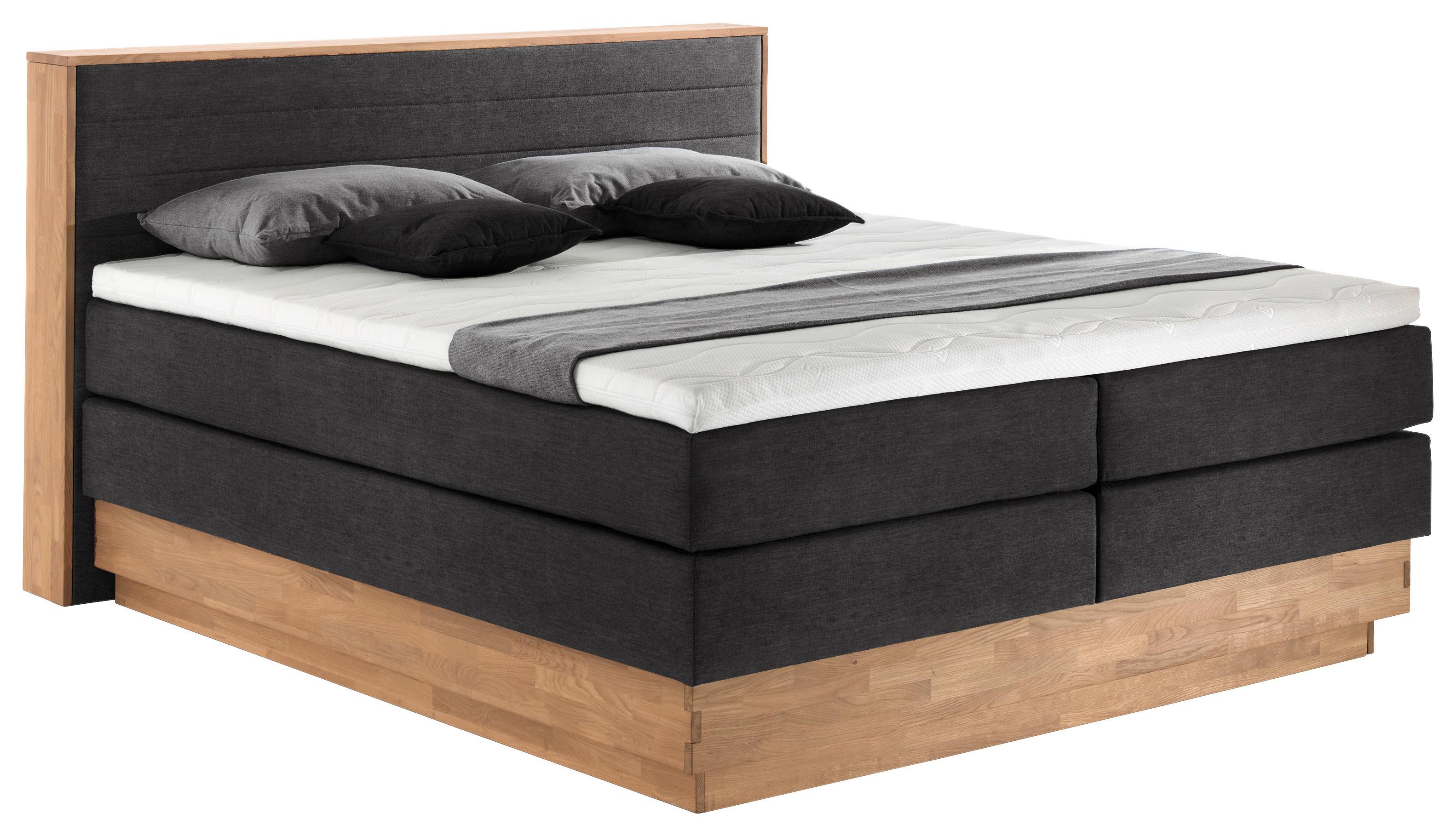 Boxspringbett in Hellgrau und Holzoptik
